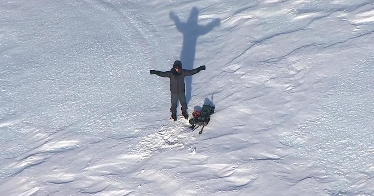 Watch: Lost climber rescued after news helicopter spots him