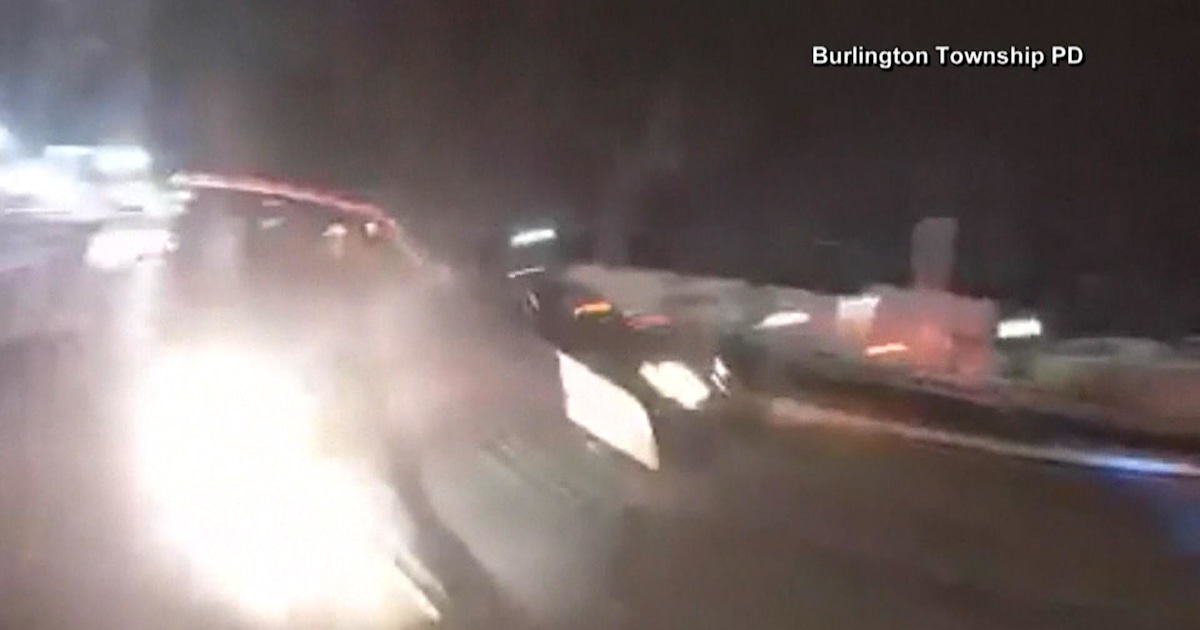 Close call: Officer escapes injury as car slams into cruiser door