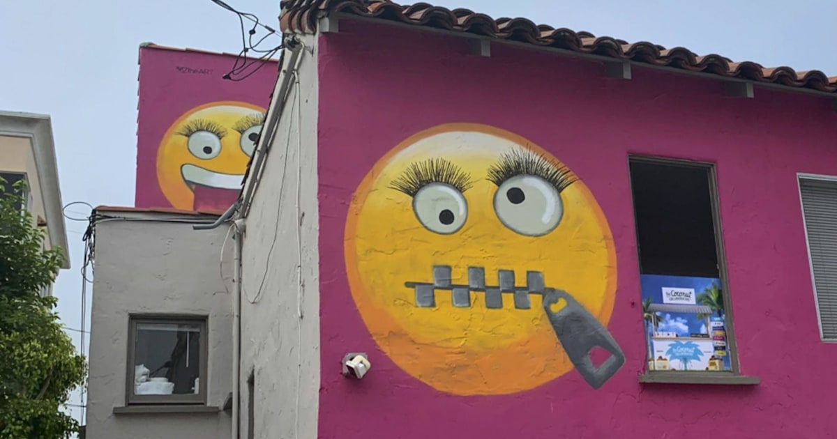 Pink emoji house launches standoff with neighbor