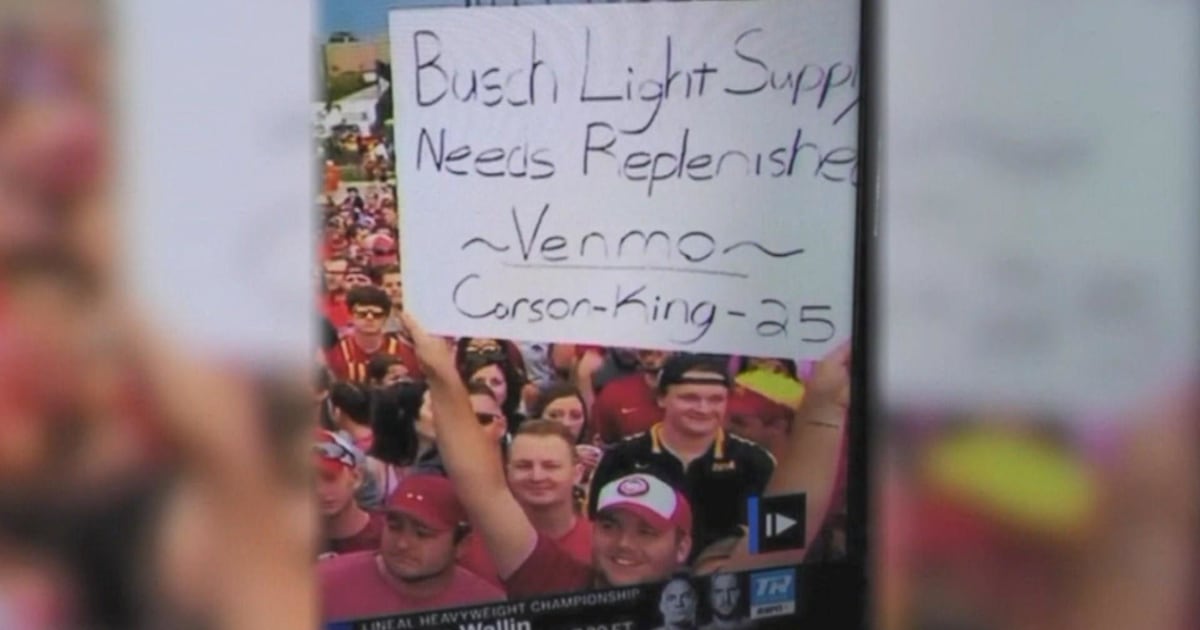 College football fan’s viral beer money sign draws $300K for charity