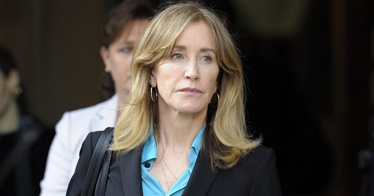 Felicity Huffman reports to prison for sentence in college scandal
