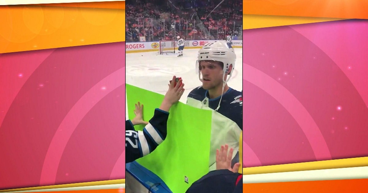 Watch this hockey player exchange a puck for candy