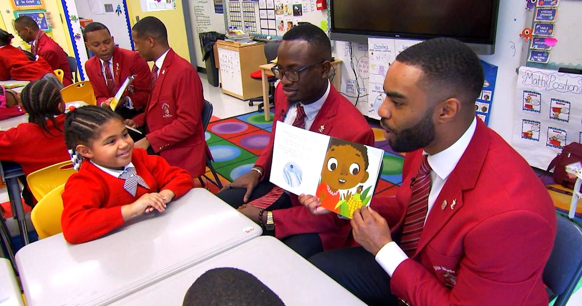Fraternity members help elementary school kids learn to love reading