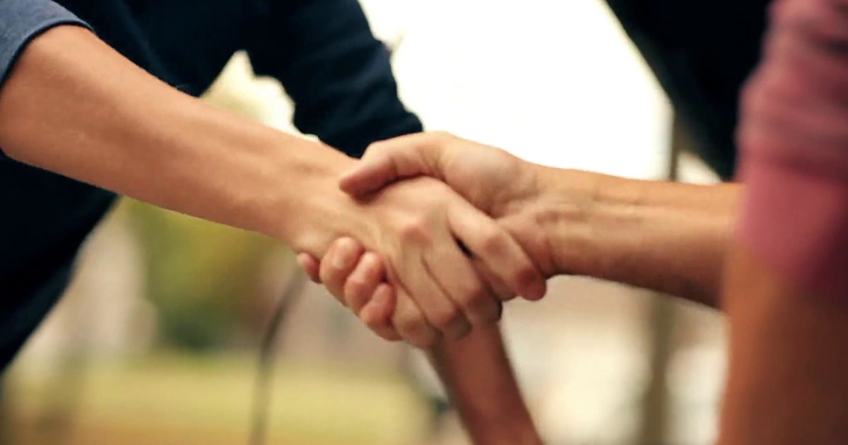 How coronavirus is changing greetings as people practice social distancing