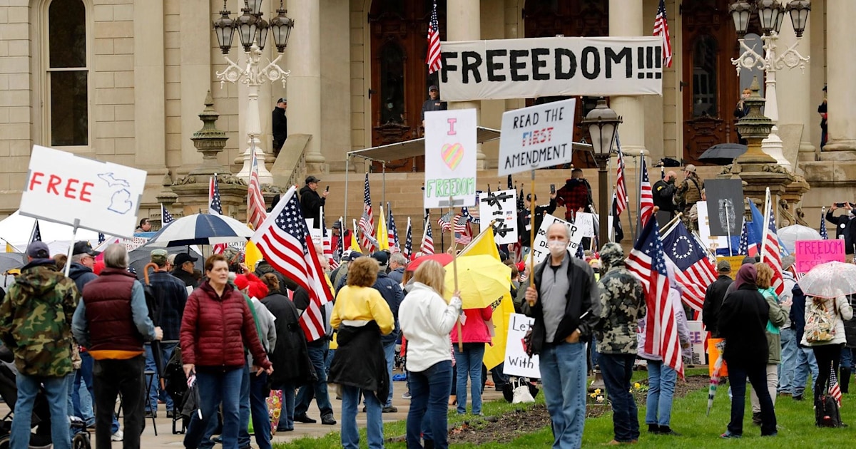 Protesters storm Michigan Capitol as more states debate reopening