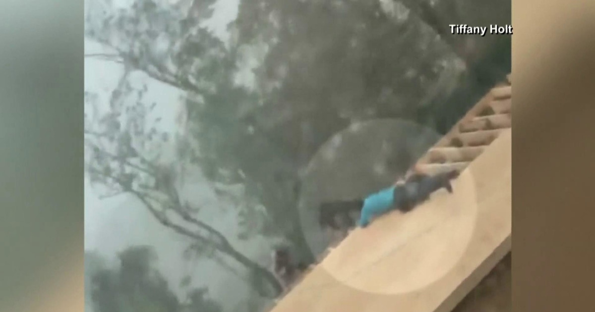 Construction crew caught off-guard by storm, caught on video