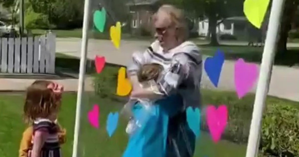 People get creative finding safe ways to hug during the pandemic