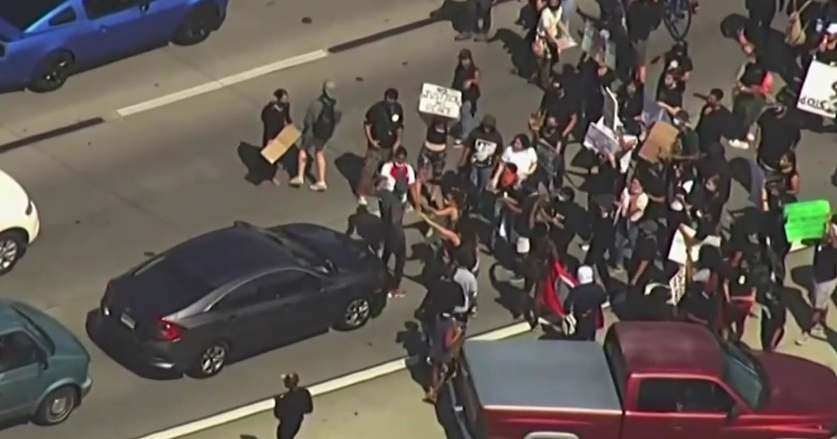 Protesters flood California highways, clashing with police