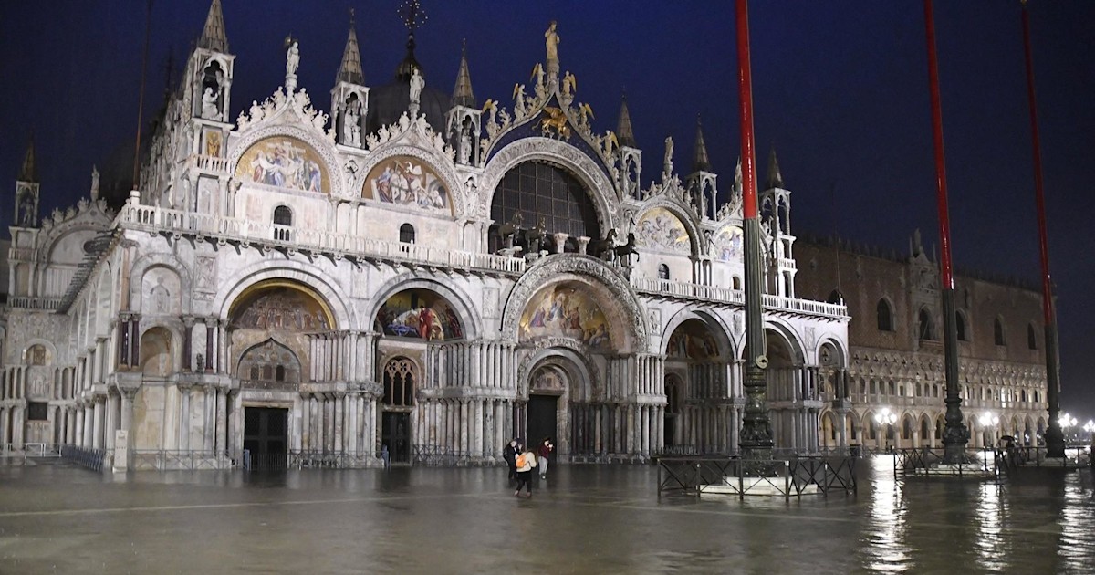 Venice submerged by floodwaters after near-record high tide