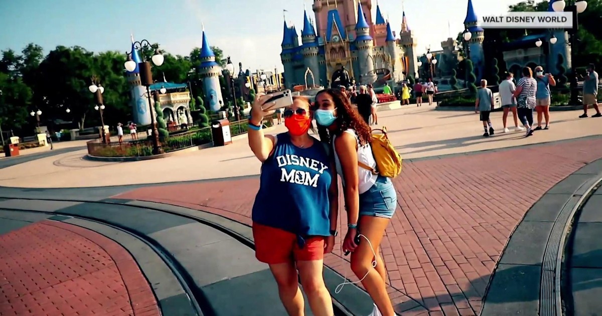 Coronavirus cases surge, hitting new record highs as Disney World reopens