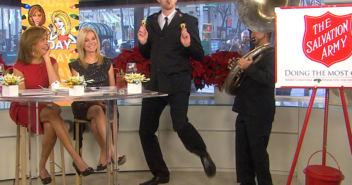 Salvation Army bell ringers dance, play kazoo