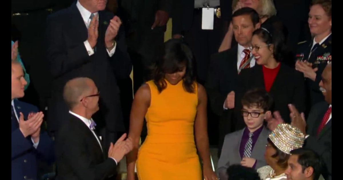 First Lady steals the show at the State of the Union in marigold dress