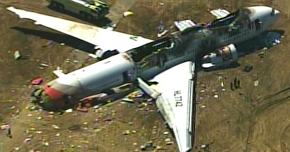 Investigators search for clues in Flight 214 crash