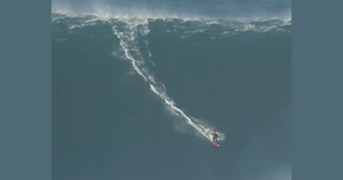 Surfer on 90-foot wave: Like riding a moving mountain