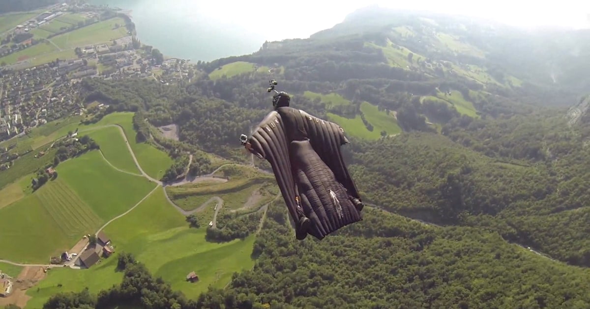 Daredevil lands 'flying dagger' jump through mountain fissure