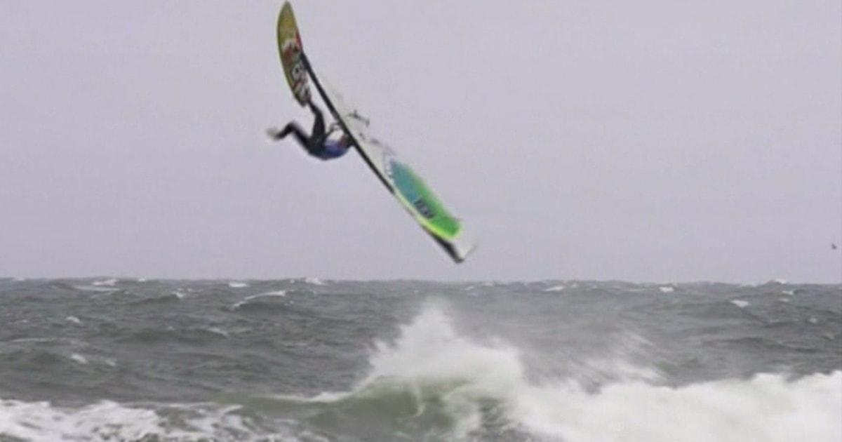 Champion windsurfers jump wave in North Sea