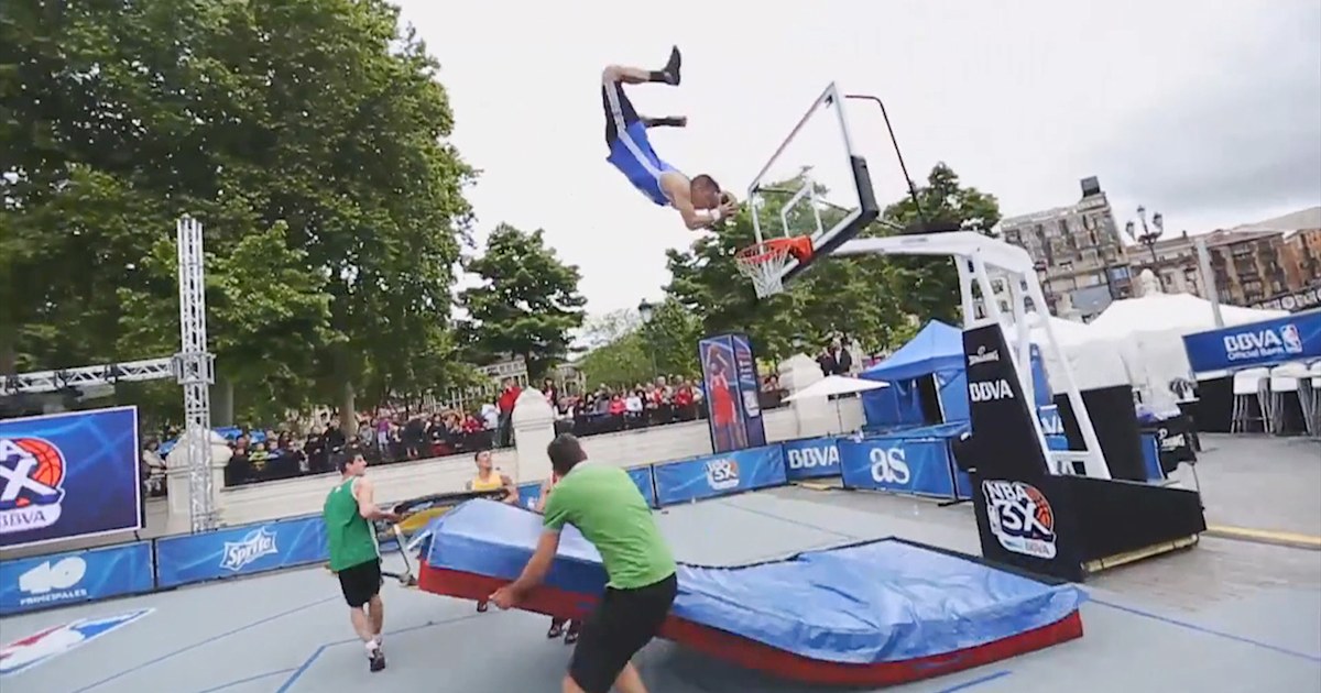 Slam dunk! Acrobat takes basketball trick shots to new level