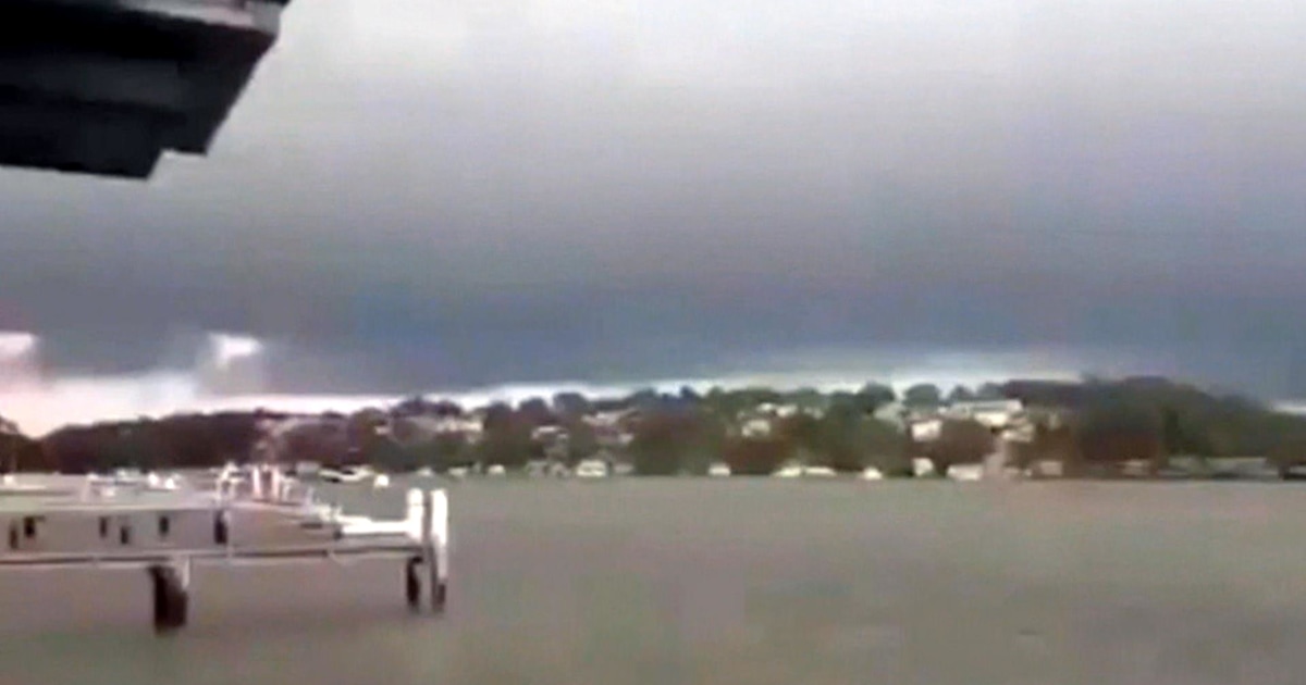 Caught on camera: 2 men survive lightning strike