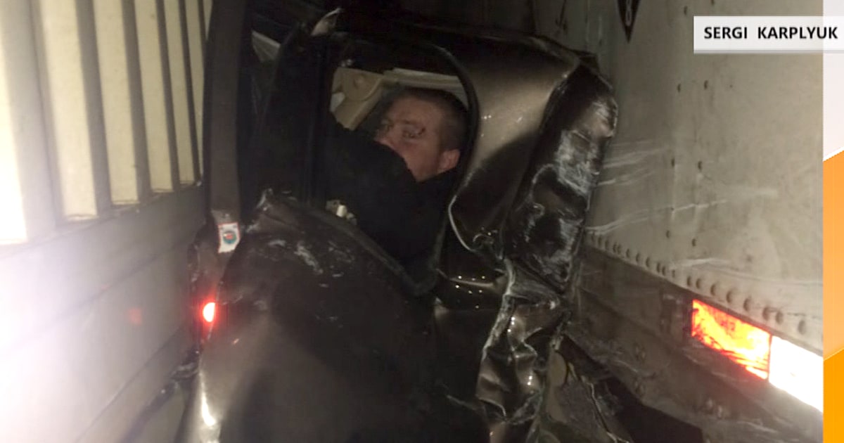 Man Survives Being Pinned Between Two Semi's
