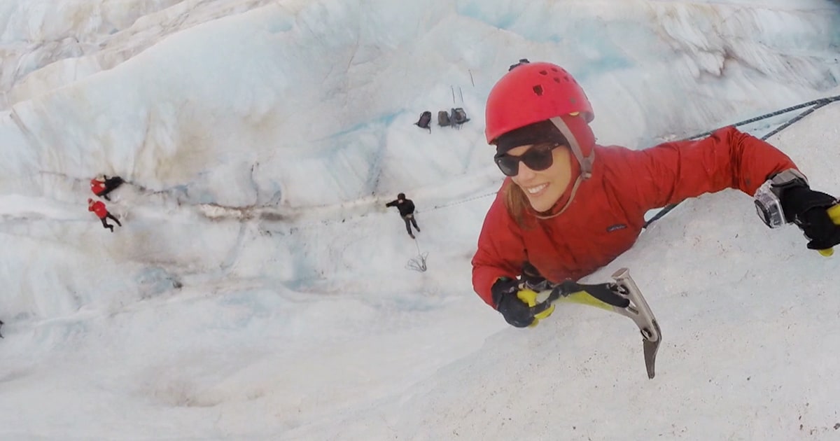 Natalie goes ice climbing at Alaskan glacier