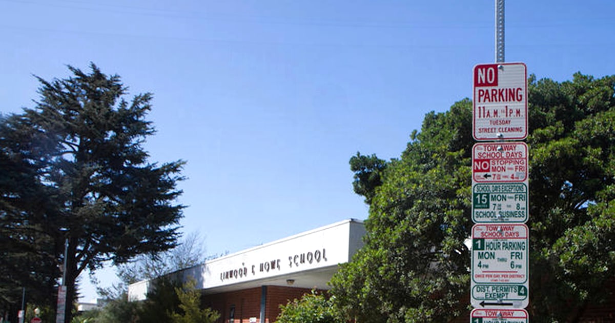 Mayor fixes towering California parking sign (sort of)