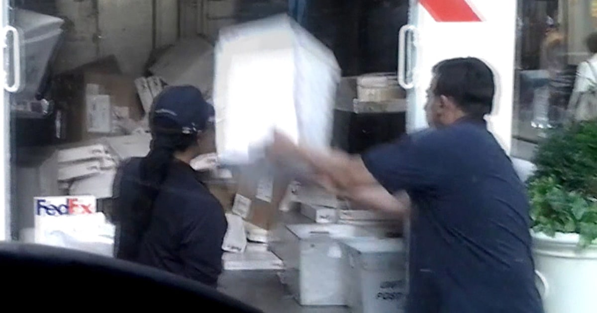 Fedex employee caught throwing boxes into truck
