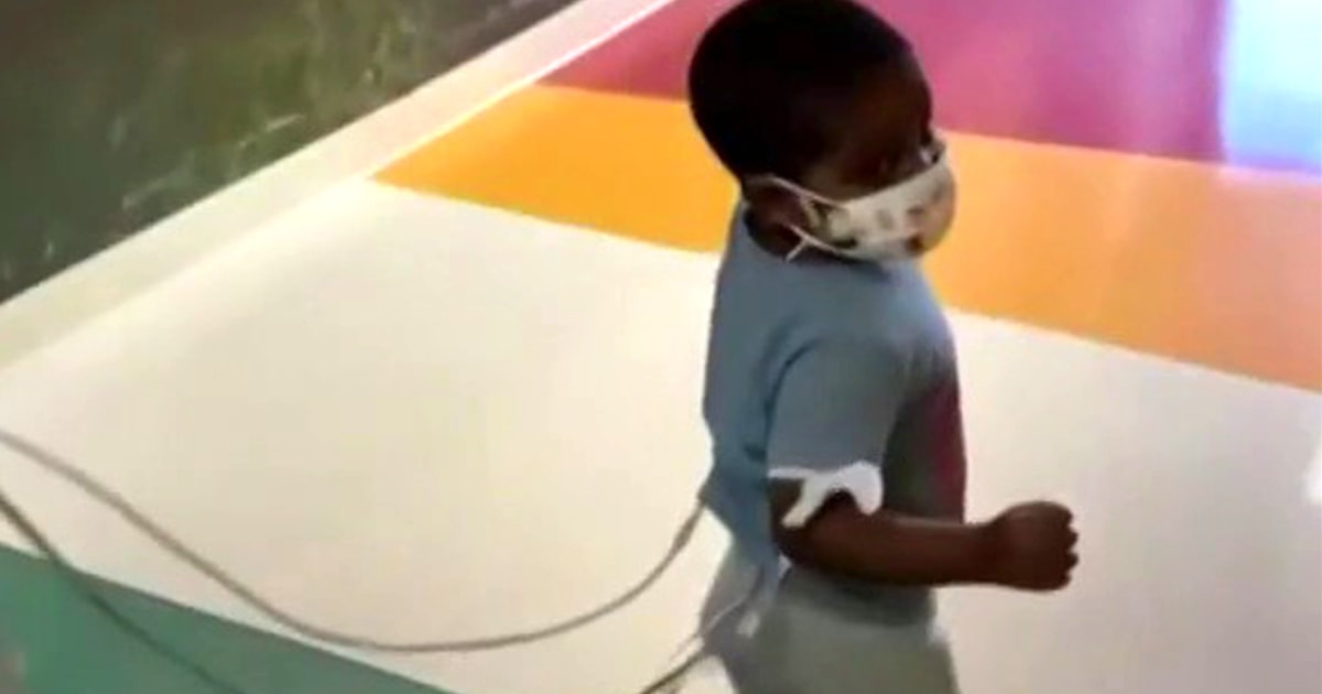 Watch this brave little boy dance his way into heart surgery