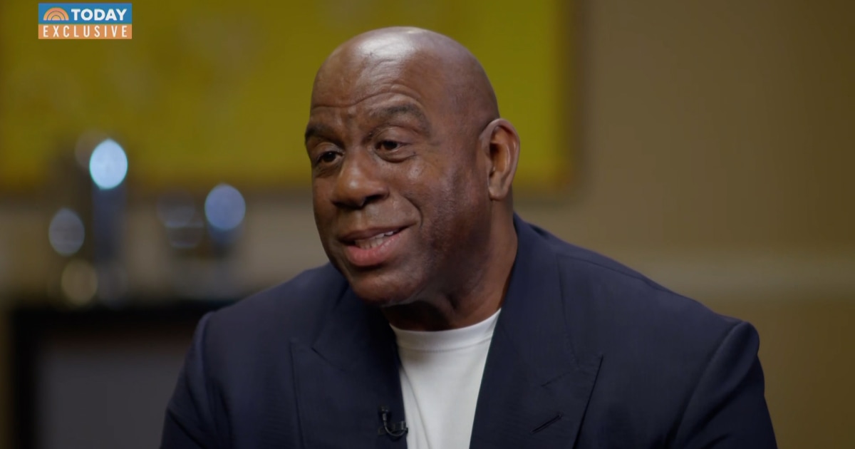 Magic Johnson reacts to reaching a deal to buy the Washington Commanders