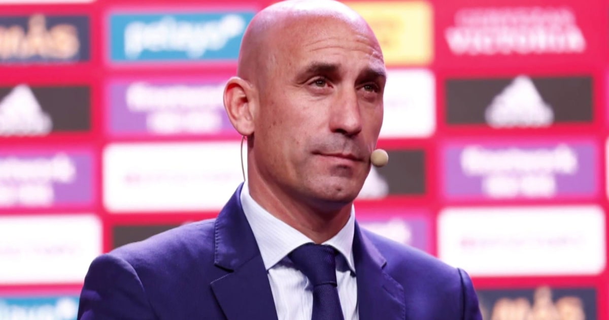 Spanish soccer chief who kissed player suspended, urged to resign