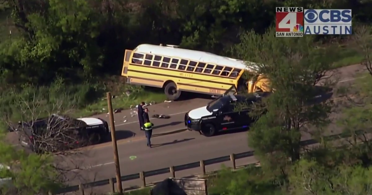 Truck going wrong way hits school bus in deadly collision
