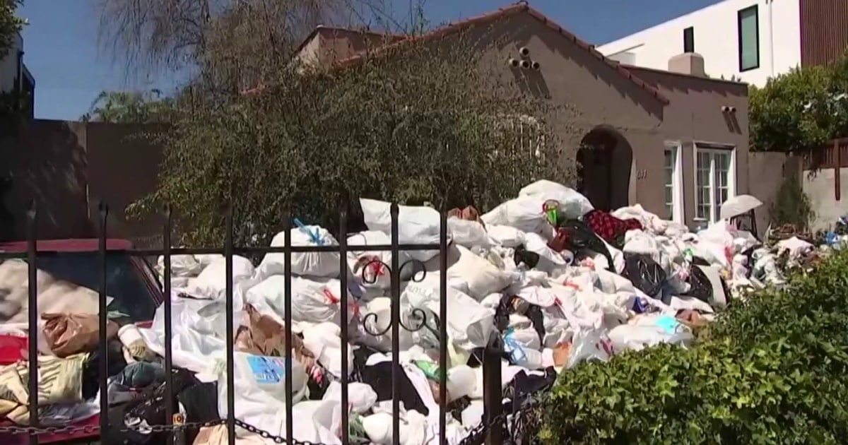 LA residents call on officials to take action over 'garbage' house