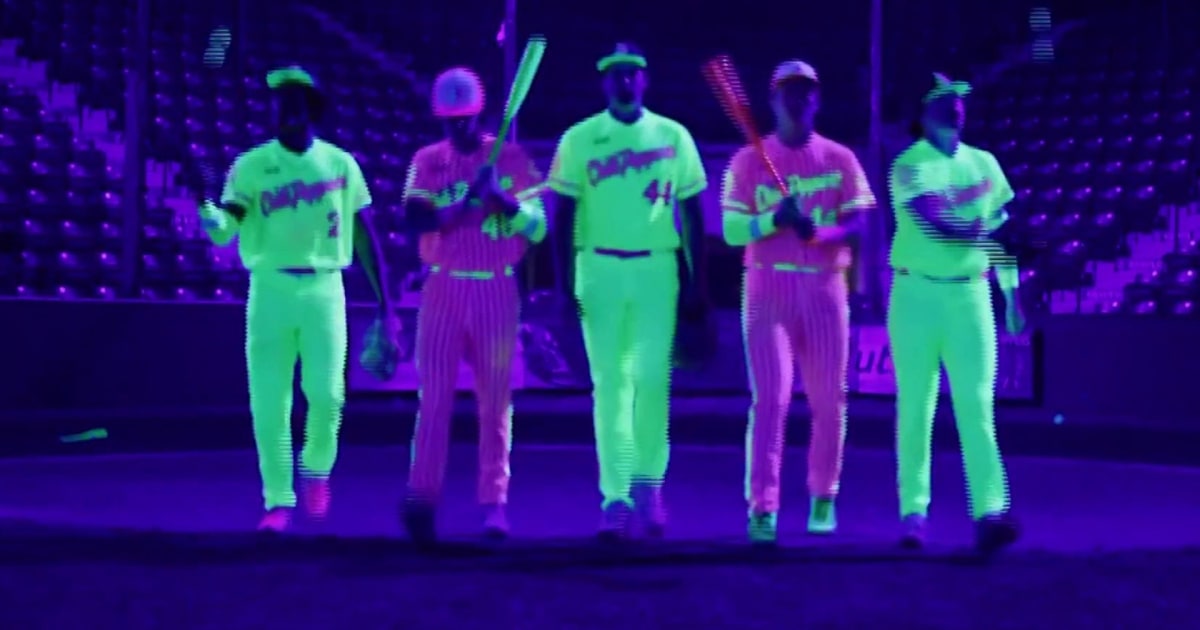 ‘Cosmic baseball’ lights up players with glow-in-the-dark uniforms