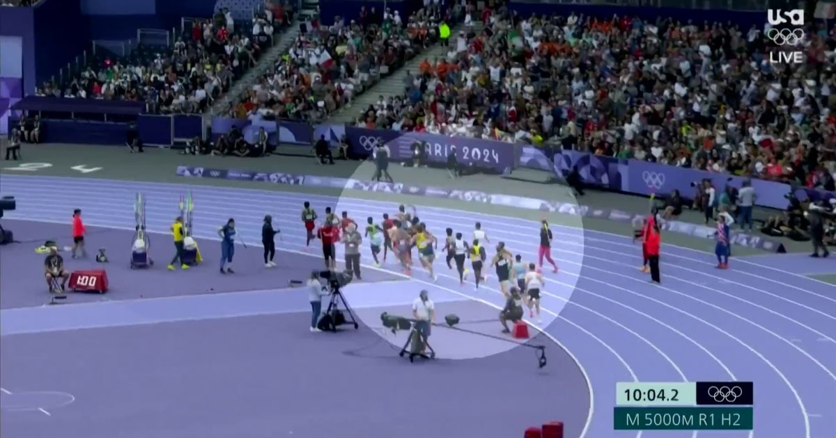 Cameraman wanders onto track during men’s 5,000-meter race