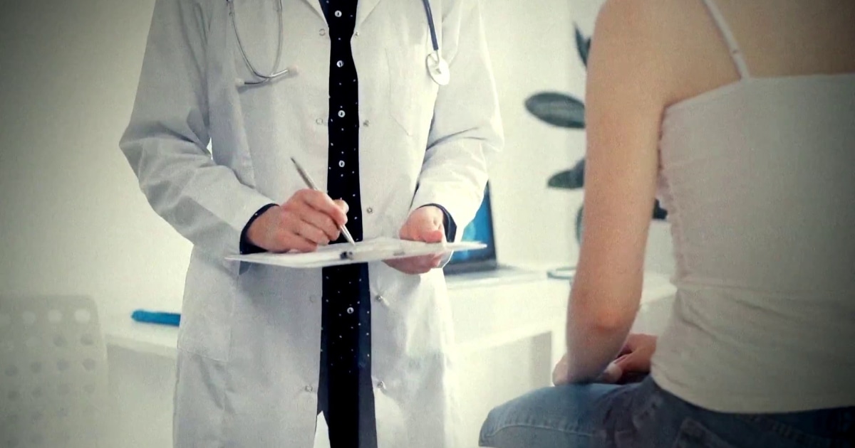 Why is there a monthlong wait to see a doctor?