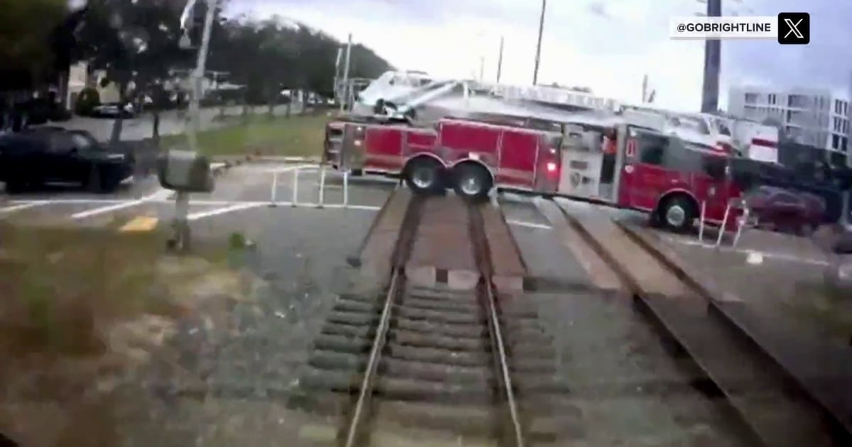 Video shows the moment before a train hits a firetruck in Florida