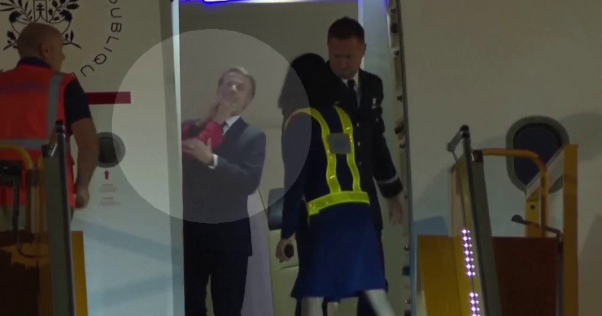 Macron downplays video appearing to show his wife push his face