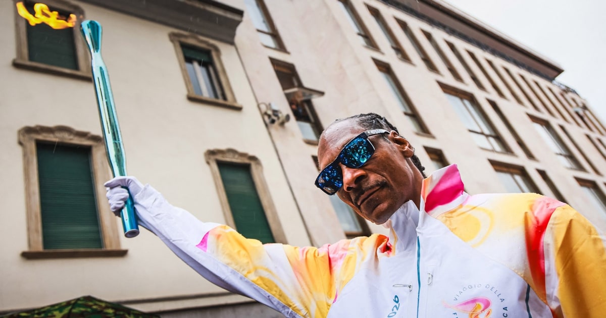See Snoop Dogg Carry the Olympic Torch Through Streets of Italy