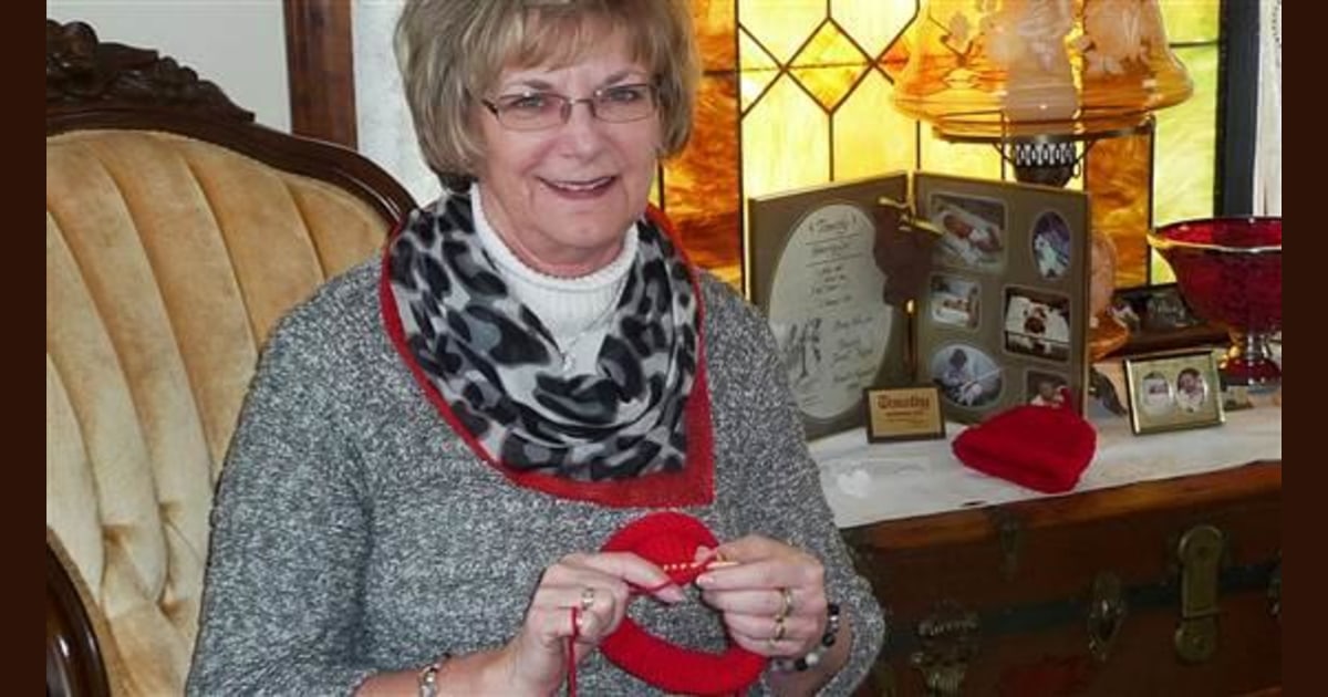 Knitting loss into love: Tiny red hats raise heart health awareness