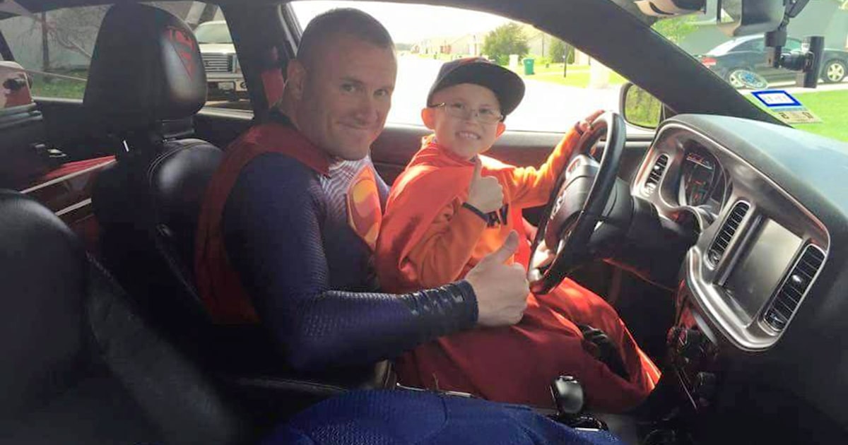 Cop dresses as Superman and drives 11 hours to surprise boy with cancer