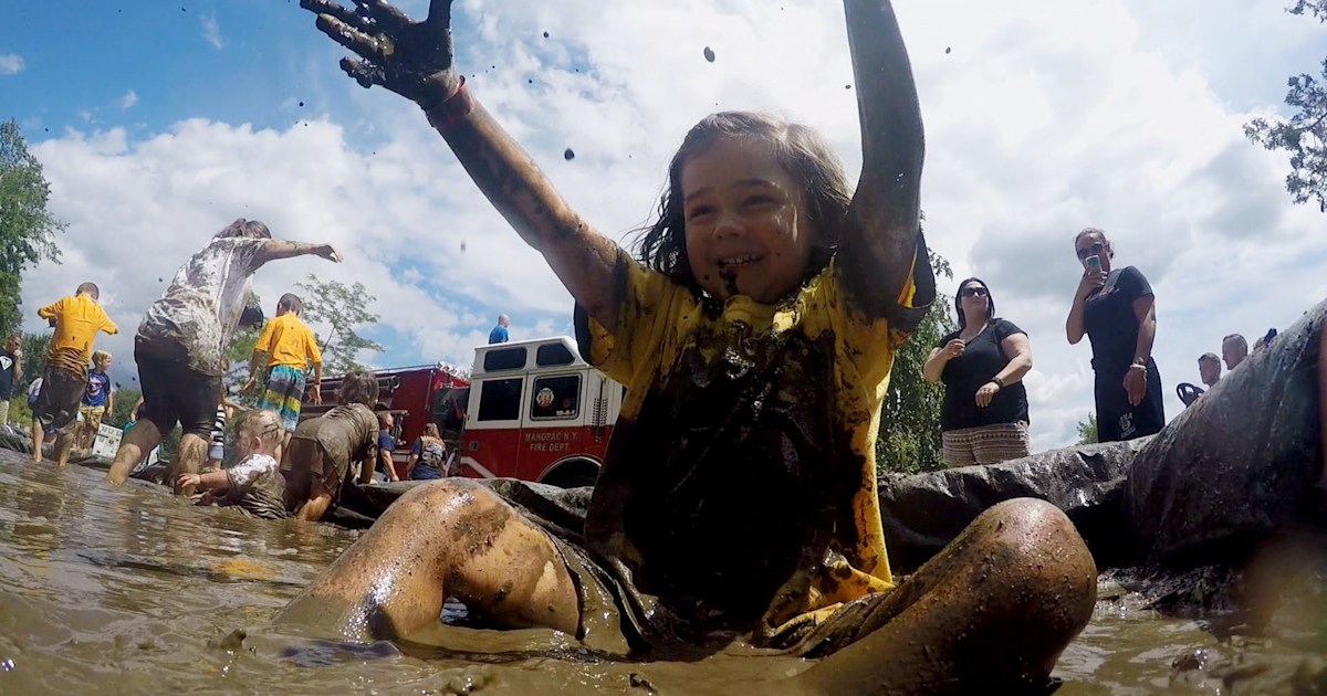 Kids make a mess in 'Muddy Puddles Project' to raise money for ...