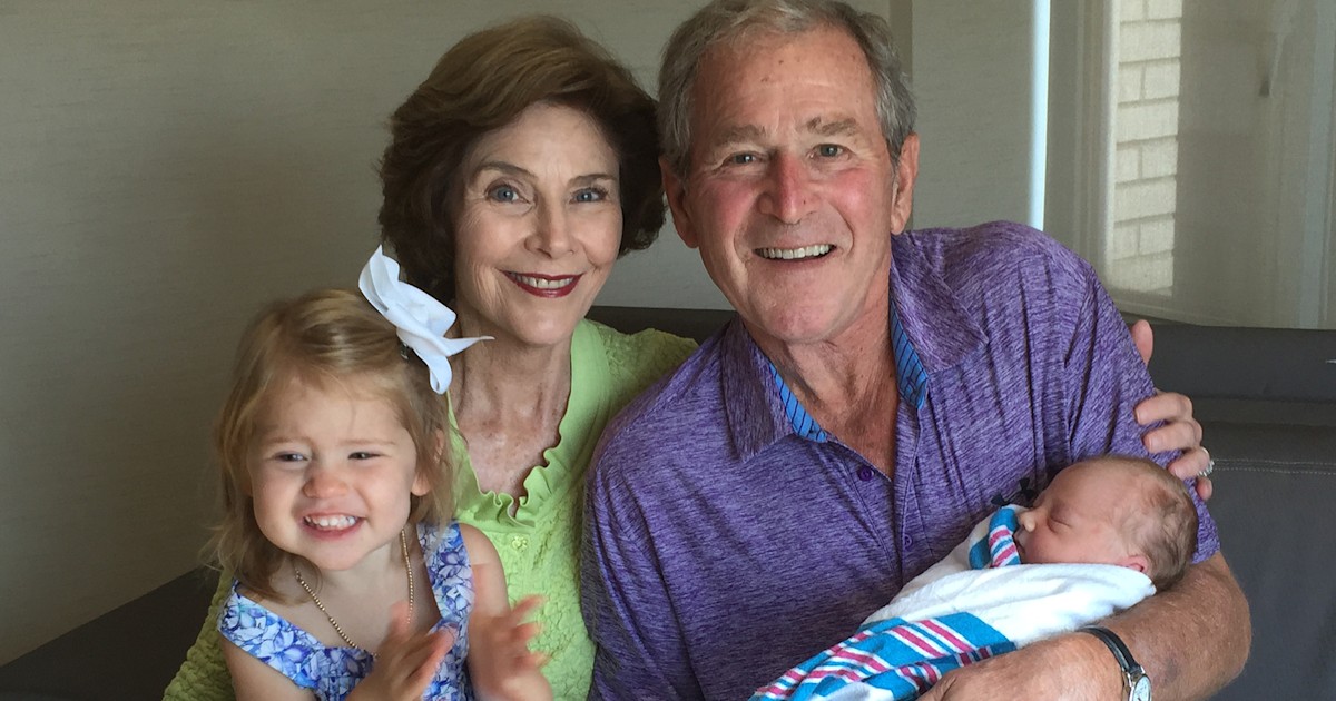 George W. Bush shares adorable photo of meeting his granddaughter photo
