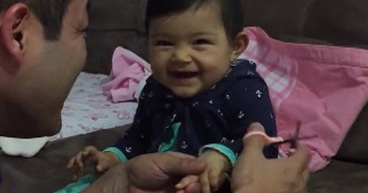 Nail fail: Adorable baby reacts to father clipping her nails