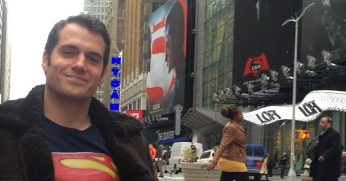 Henry Cavill goes unrecognized next to Superman billboard in Times Square