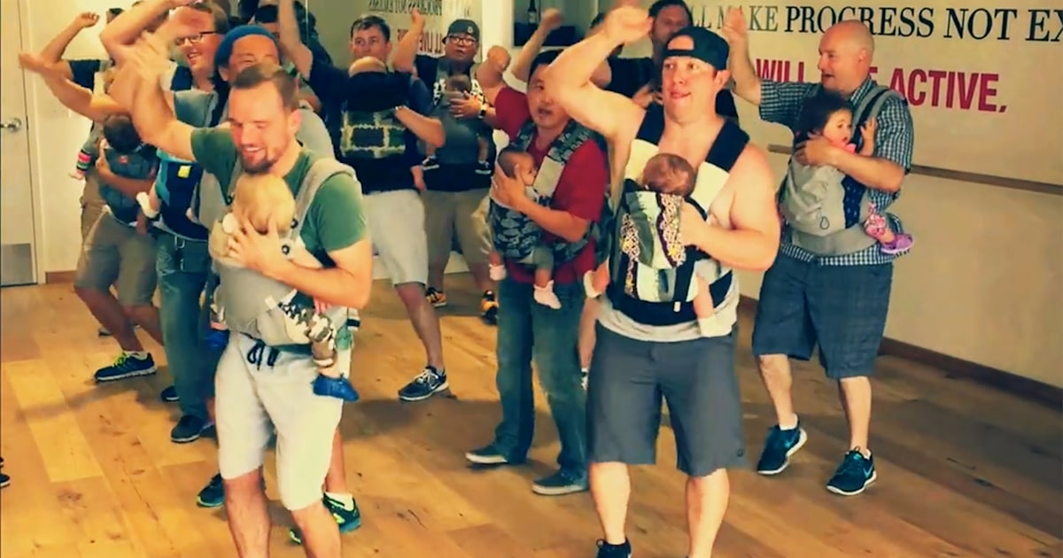 Babywearing dads dance to 'Play That Funky Music' in hilarious video