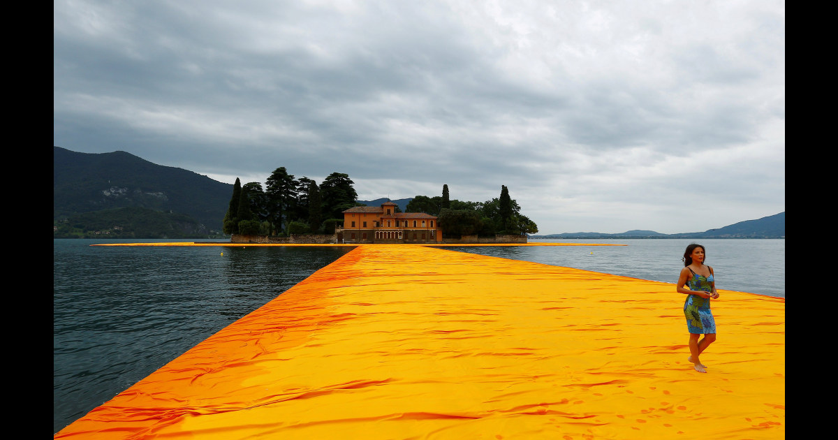 Christo's 'Floating Piers' artwork lets people walk across a lake in Italy