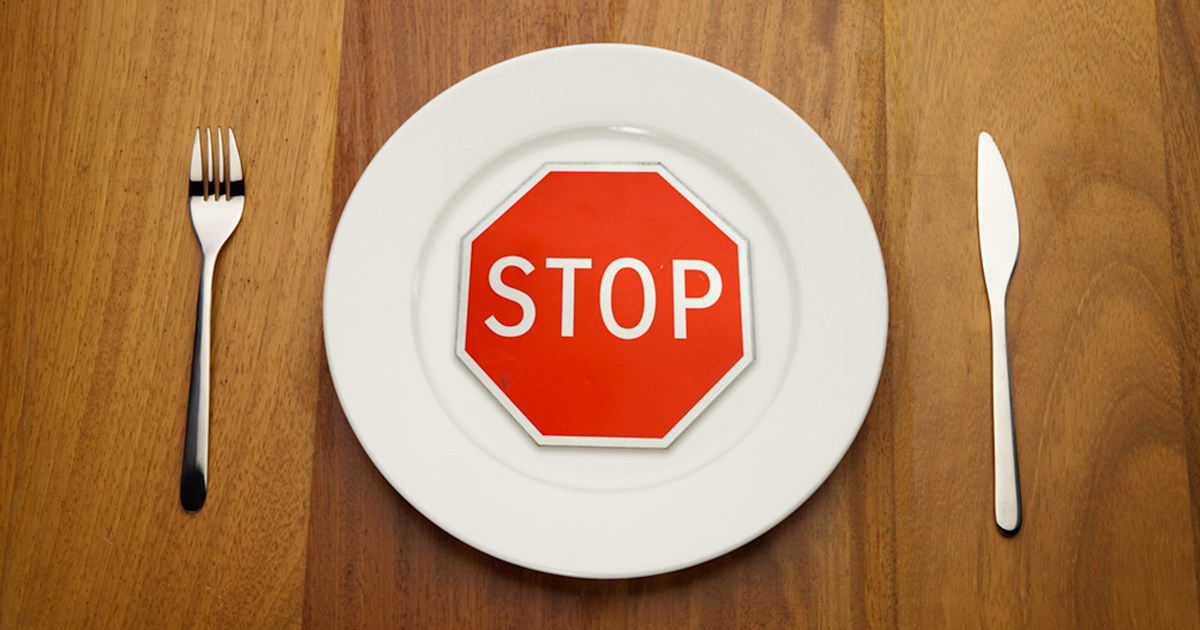 Stop! When we see a red light on the menu, we eat less