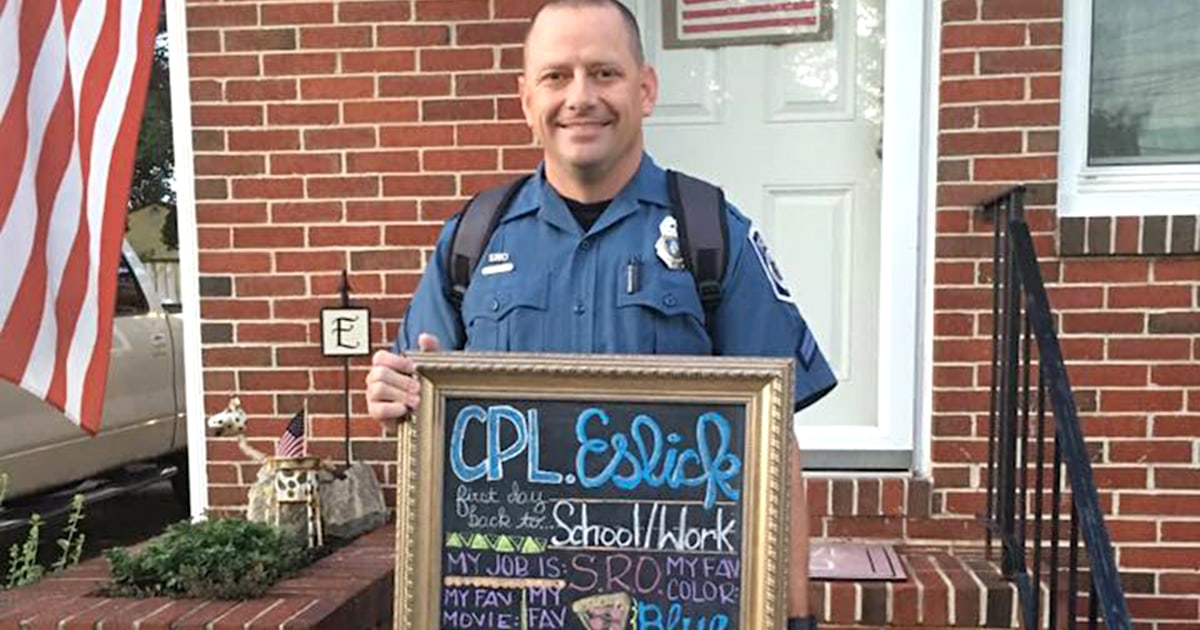 School police officer takes back-to-school photo