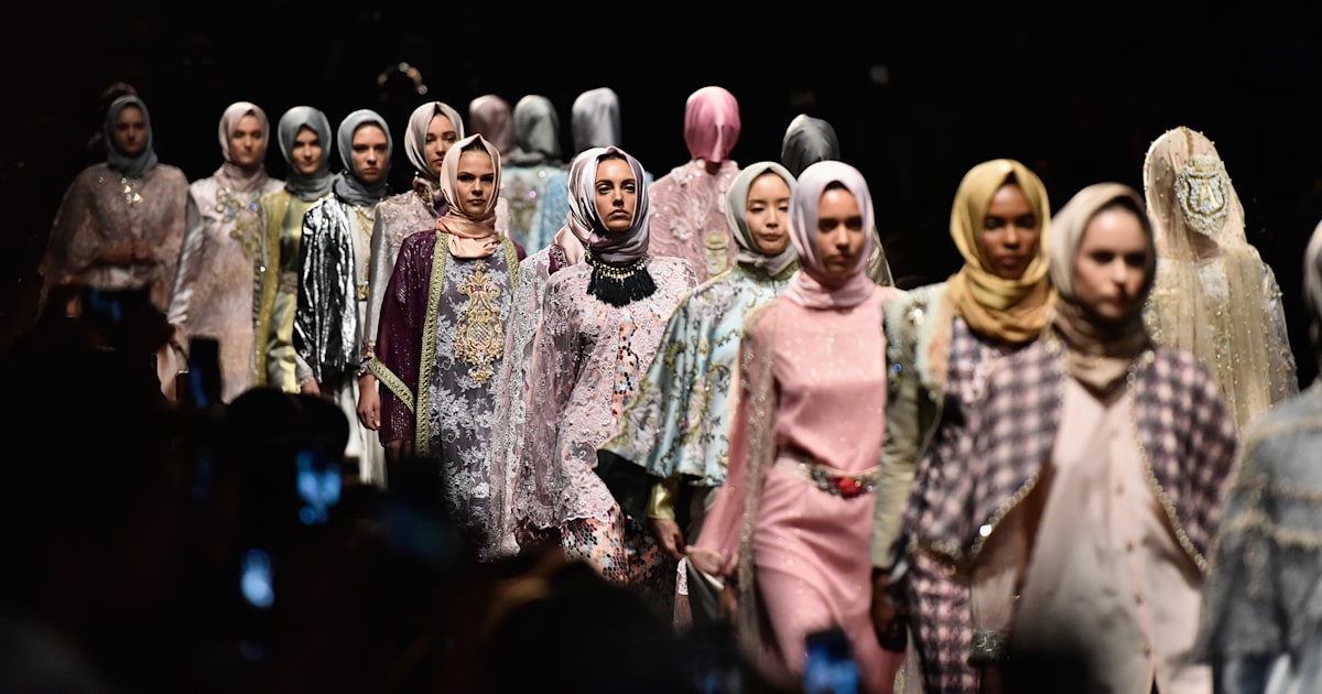 Designer’s historic all-hijab runway show gets standing ovation