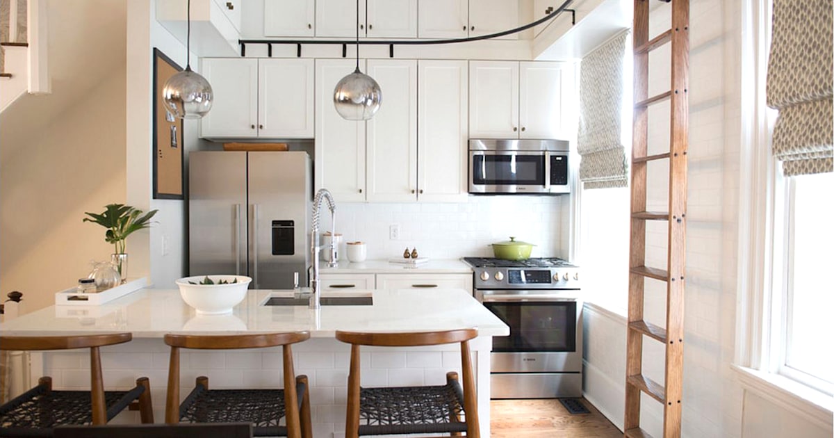 Kitchen maximizes storage with the help of a ladder — see how