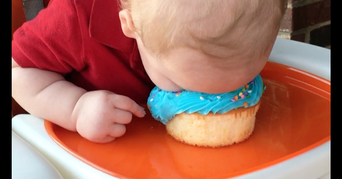 Adorable baby sees birthday cake, dives in headfirst